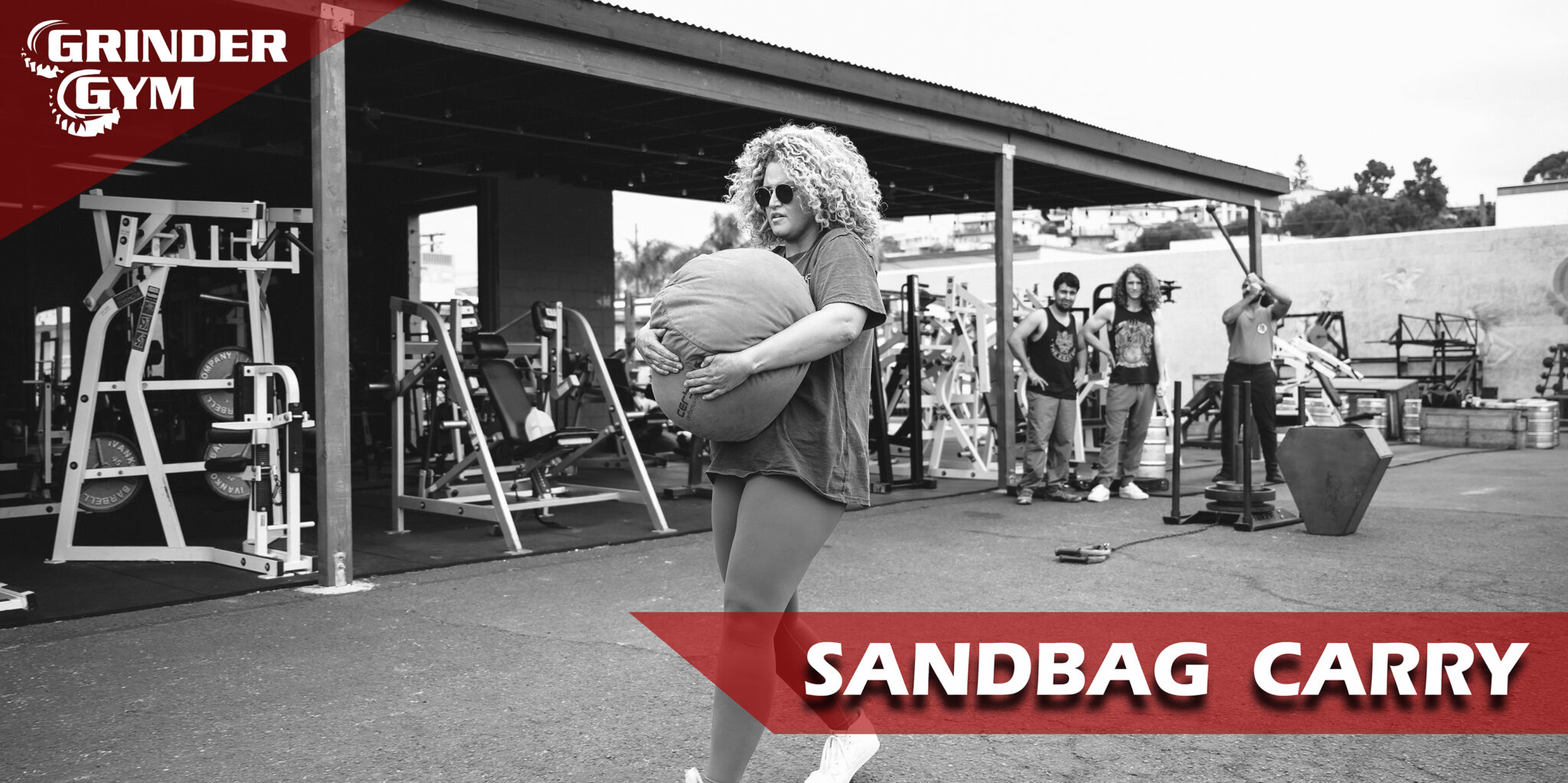Sandbag Carry - Grinder Gym