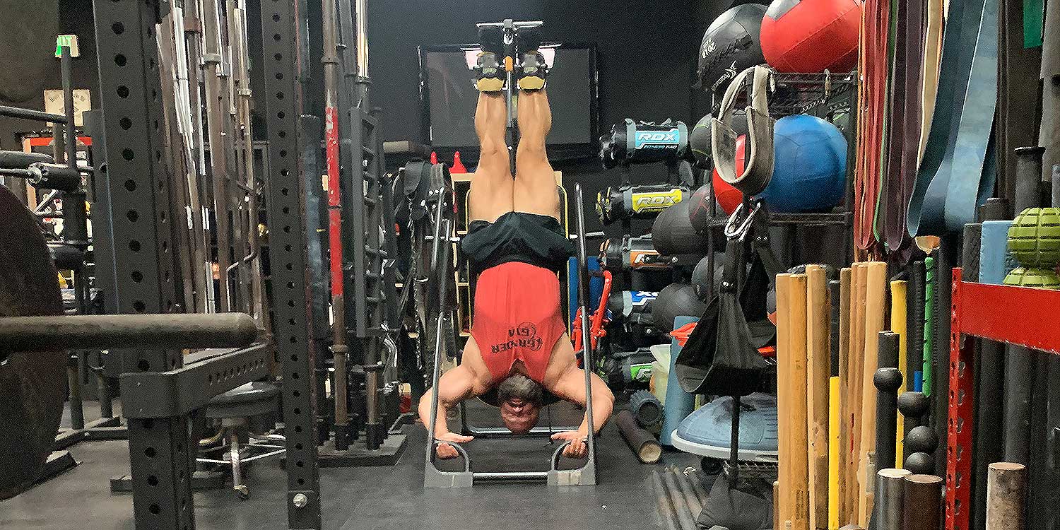 Decompressing the Spine: Inversion Therapy for Athletes – Grinder Gym